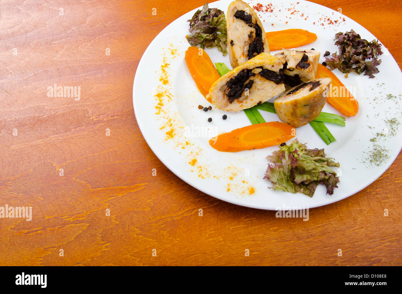 Meat and vegetable roll in plate Stock Photo - Alamy
