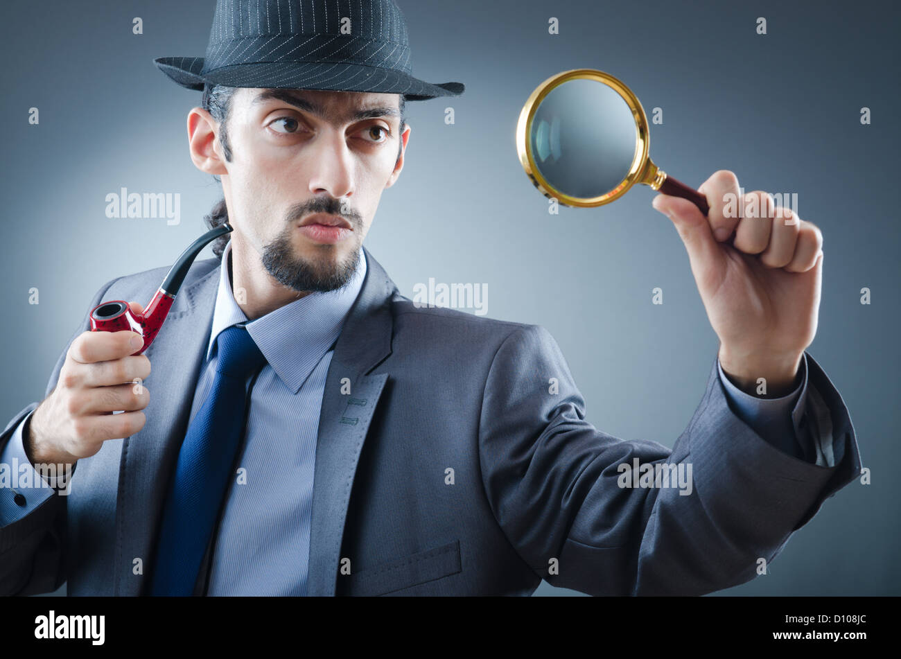 Young detective smoking pipe hi-res stock photography and images - Alamy