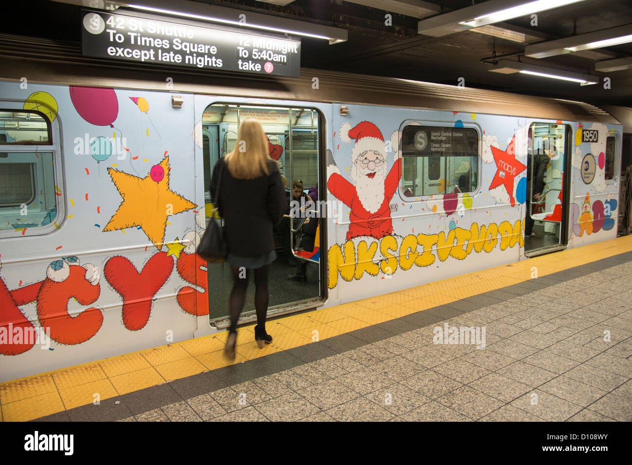 New York subway train sponsored by Macy's store with Christmas theme ...