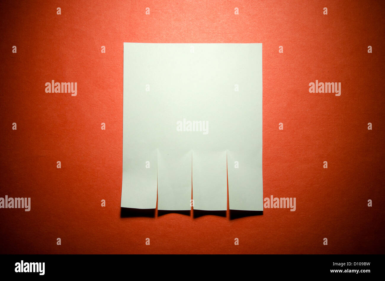 Tear off paper notice on the wall Stock Photo - Alamy