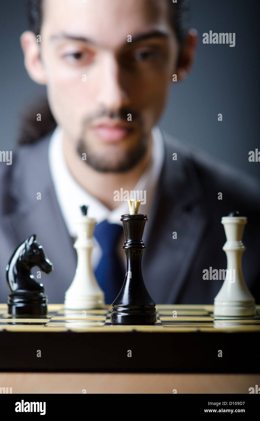 Chess player playing his game Stock Photo - Alamy