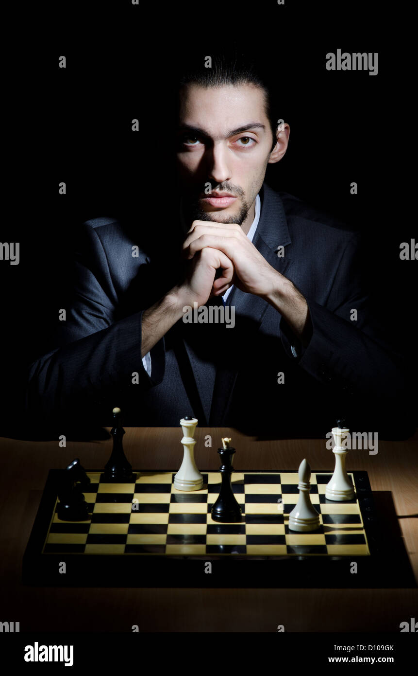 Chess player playing his game Stock Photo - Alamy