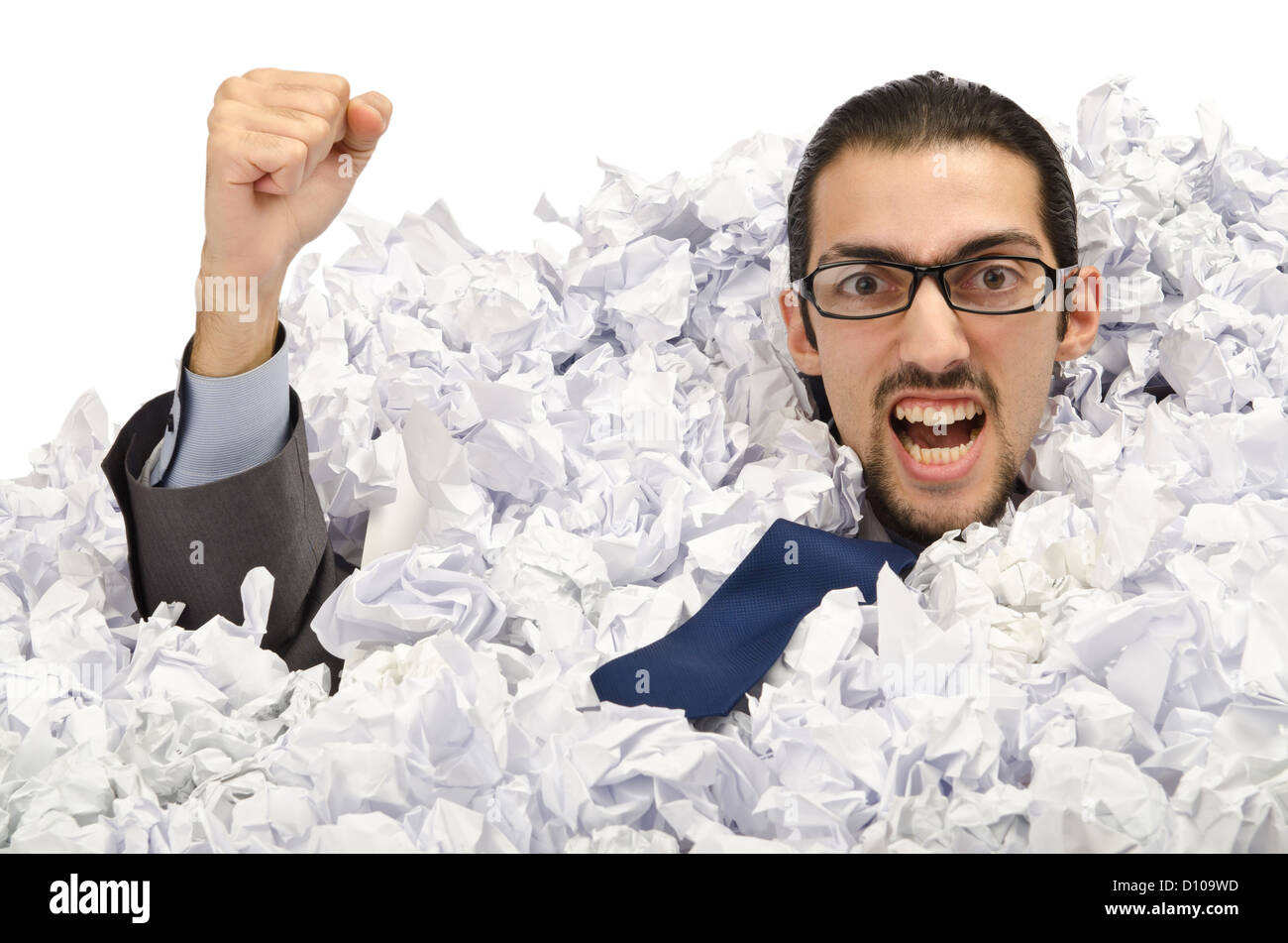 Man with lots of waste paper Stock Photo - Alamy
