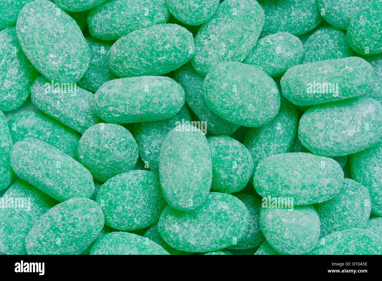 Colorful green candies covered with sugar Stock Photo - Alamy