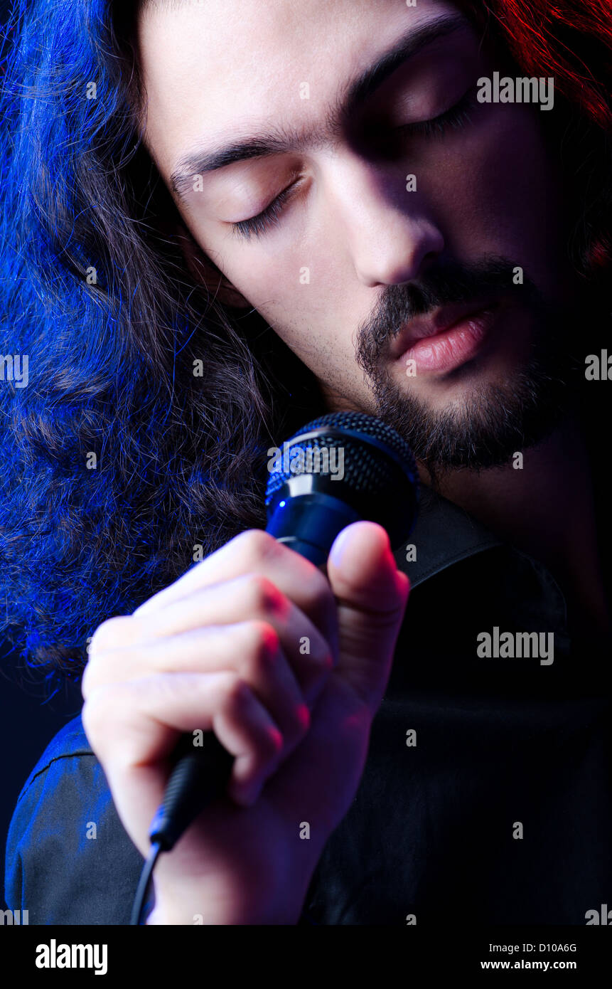 Man singing at the concert Stock Photo - Alamy