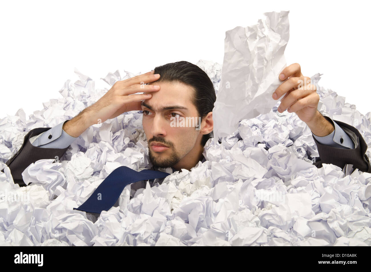 Man with lots of crumpled paper Stock Photo - Alamy