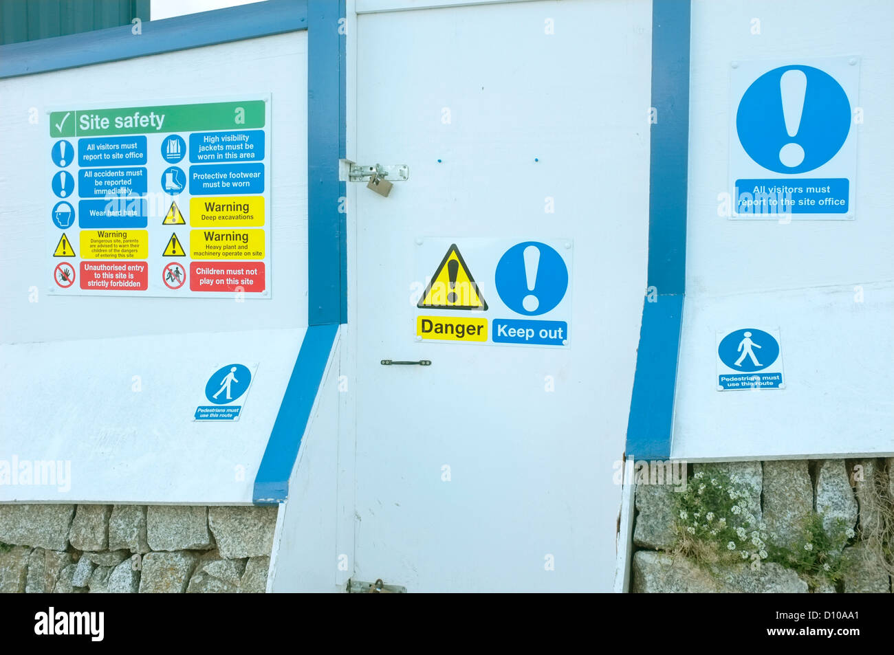 Warning signs on a demolition site Stock Photo - Alamy