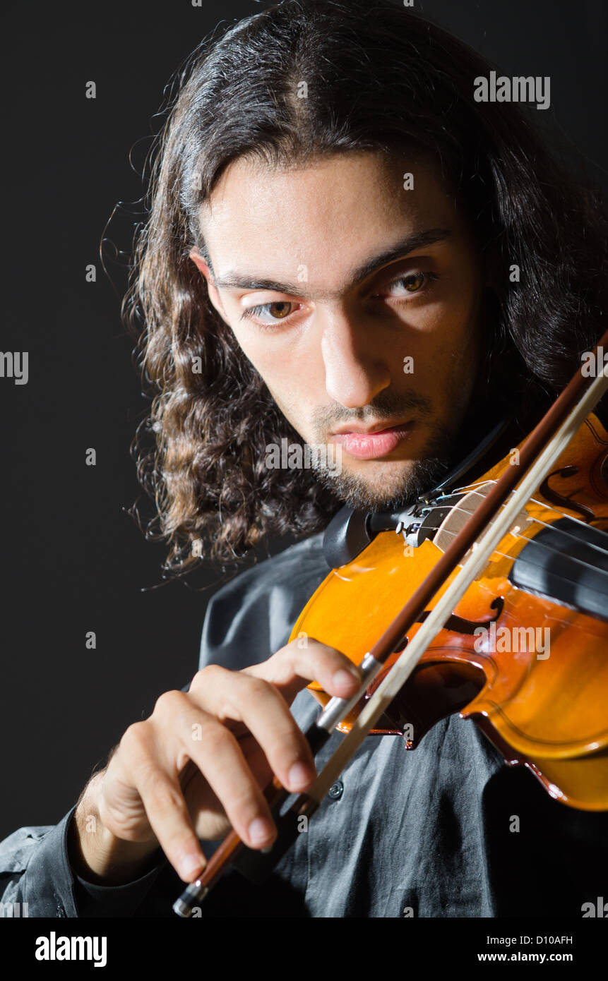Fiddler playing the violin Stock Photo - Alamy