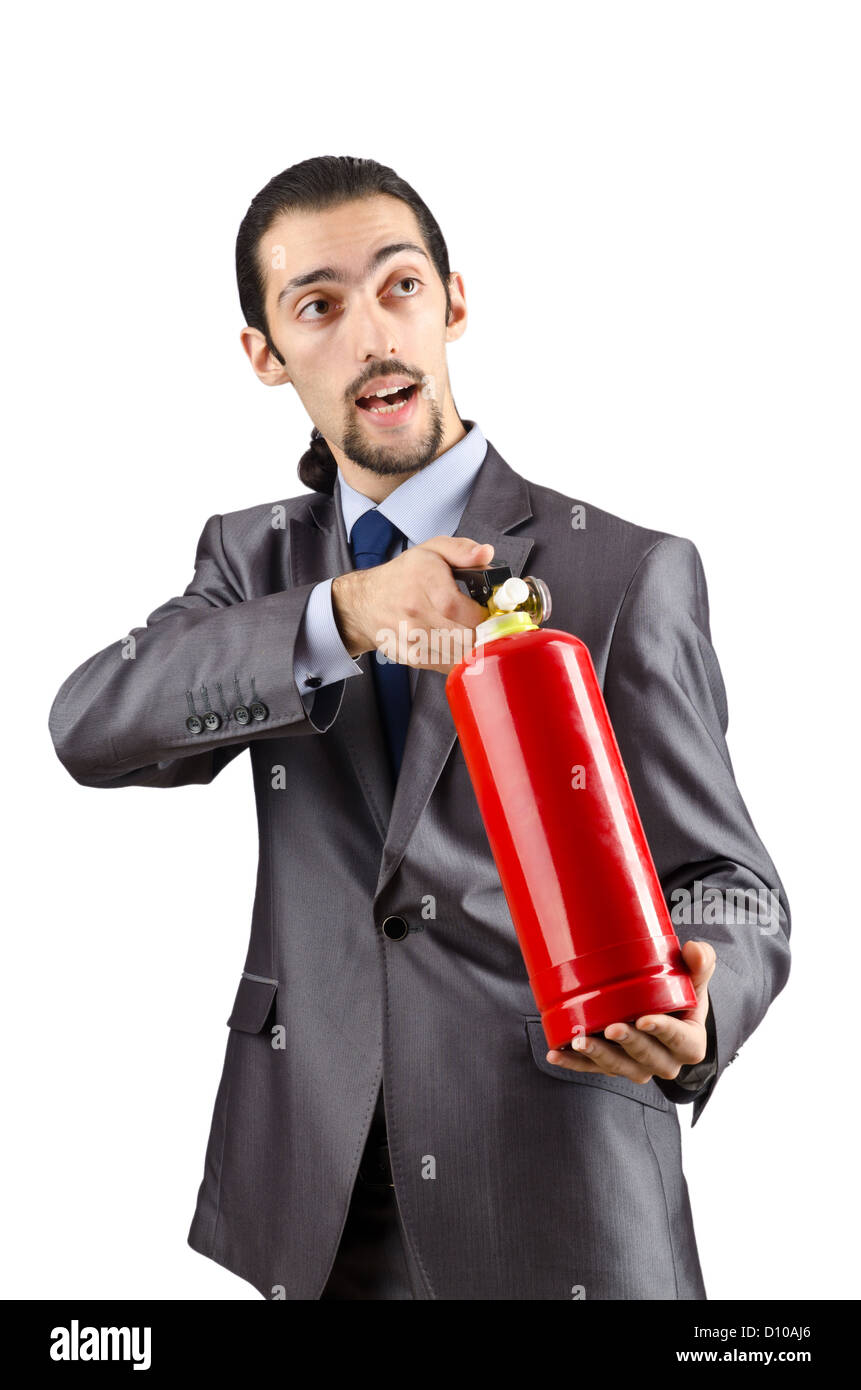 Man with fire extinguisher in firefighting concept Stock Photo - Alamy