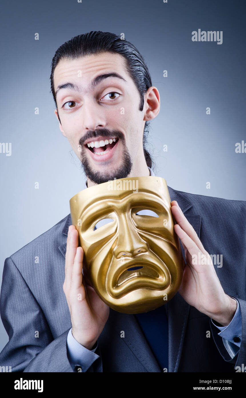 Businessman with mask concealing his identity Stock Photo - Alamy