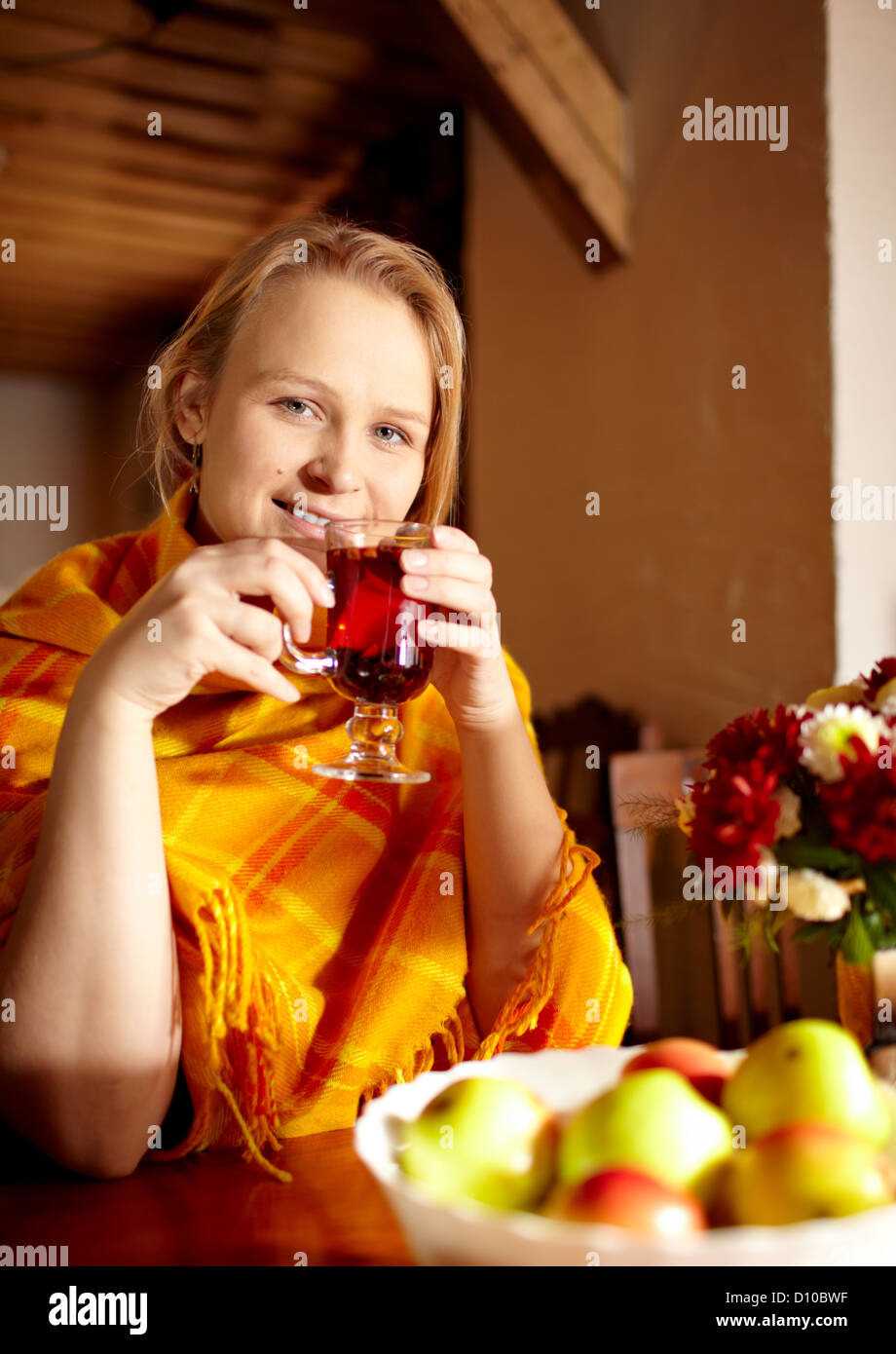 Young woman is drinking tea Stock Photo - Alamy