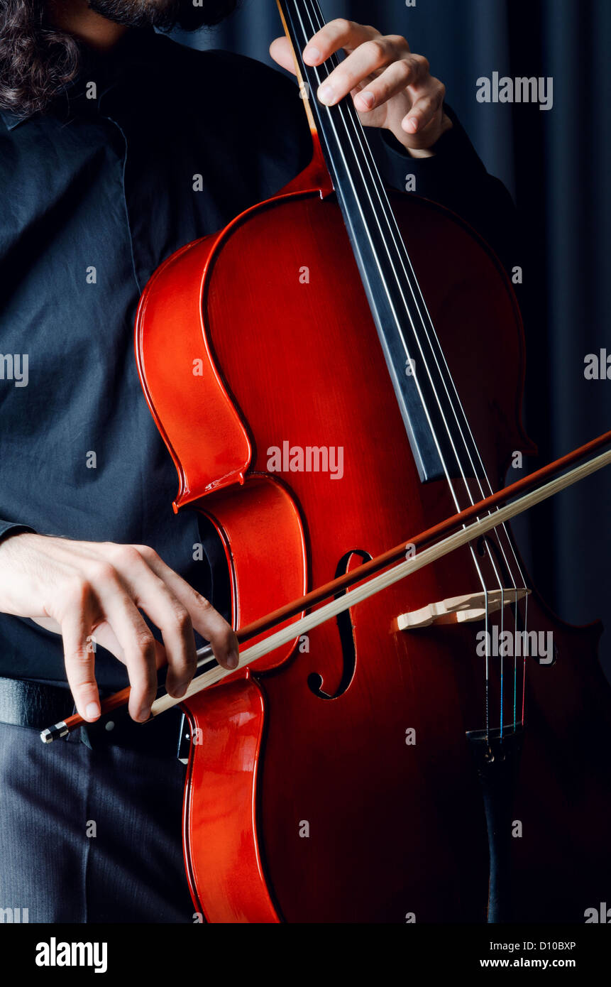 Cello player during performance Stock Photo - Alamy