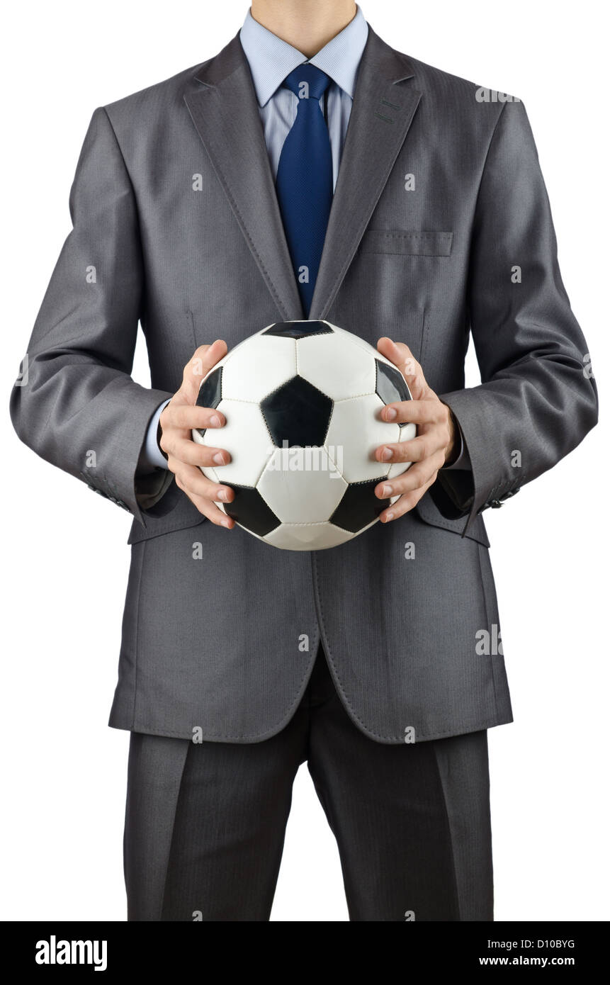 Businessman holding football on white Stock Photo - Alamy