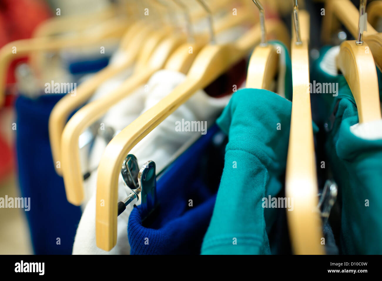 Hangers in the clothing store Stock Photo - Alamy
