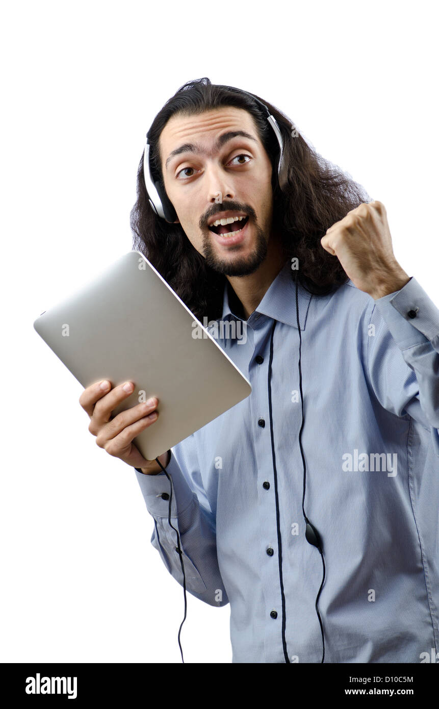 Student listening music with tablet computer Stock Photo - Alamy