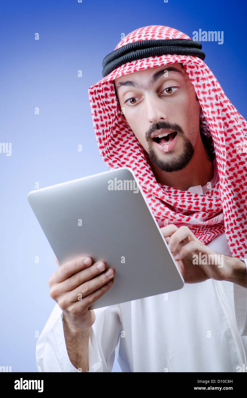 Young arab with tablet computer Stock Photo - Alamy