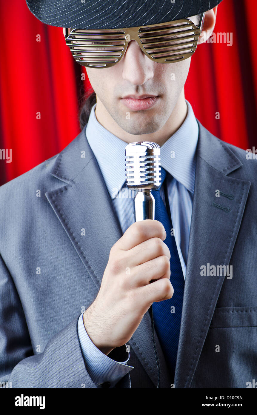 Man performing at the concert Stock Photo - Alamy