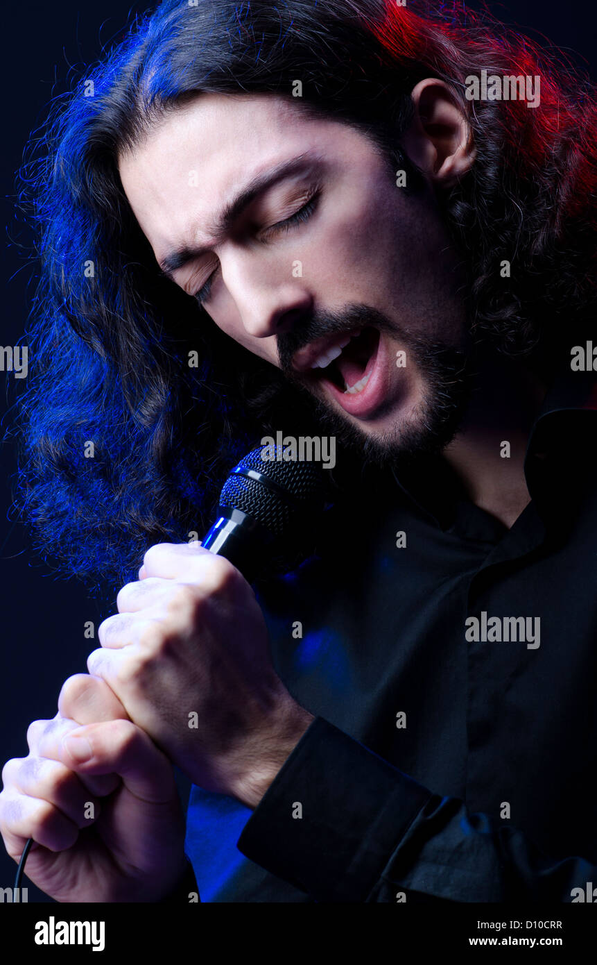 Man singing at the concert Stock Photo - Alamy