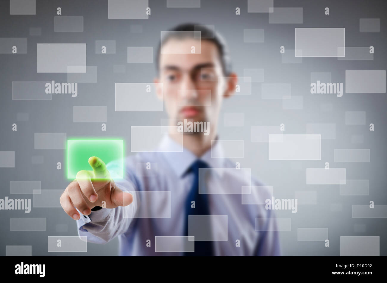 Businessman pressing virtual buttons Stock Photo - Alamy