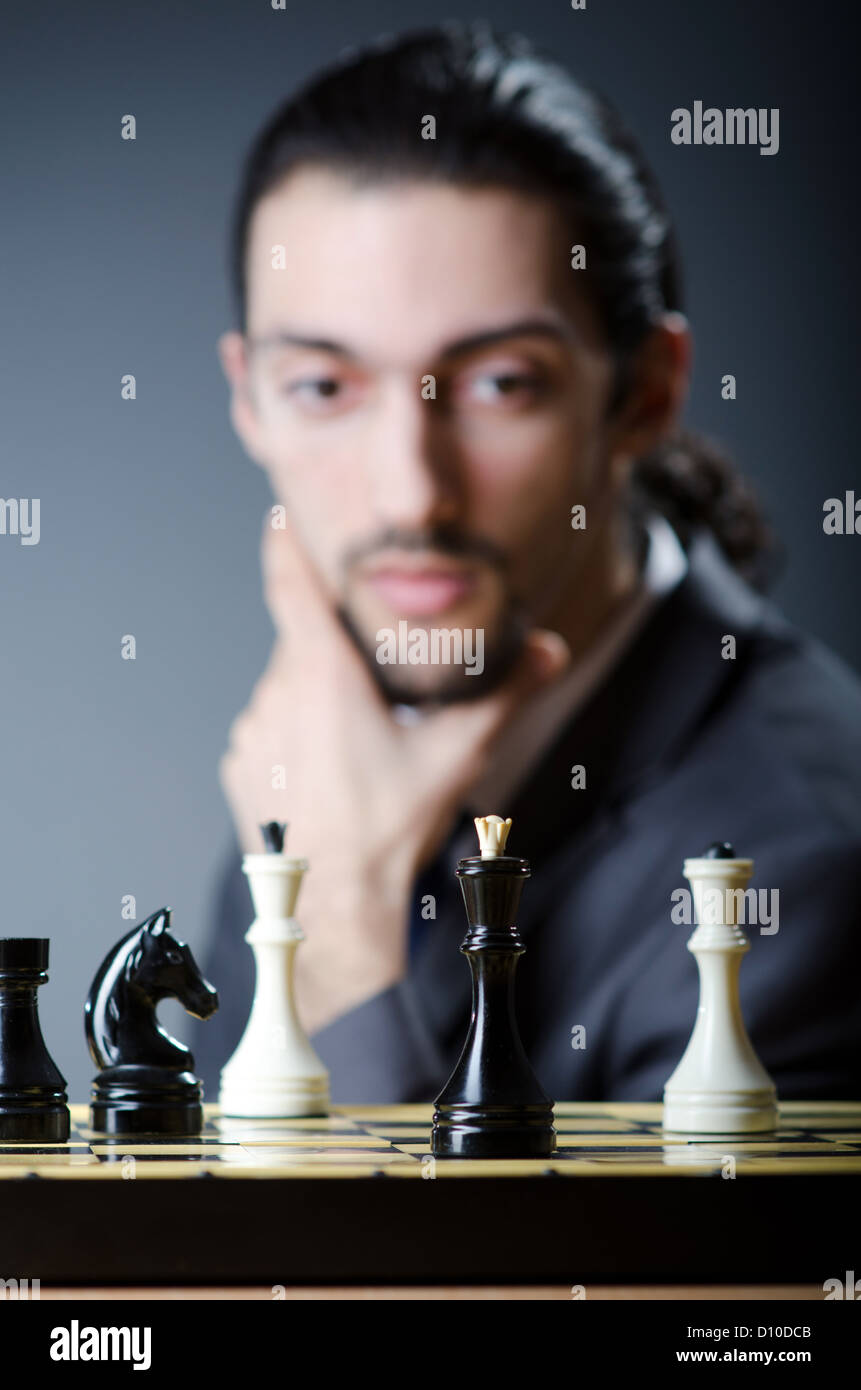 Chess player playing his game Stock Photo - Alamy
