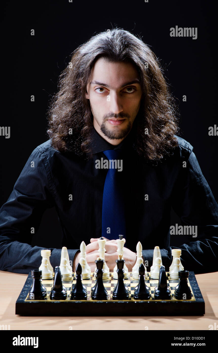 Chess player playing his game Stock Photo - Alamy