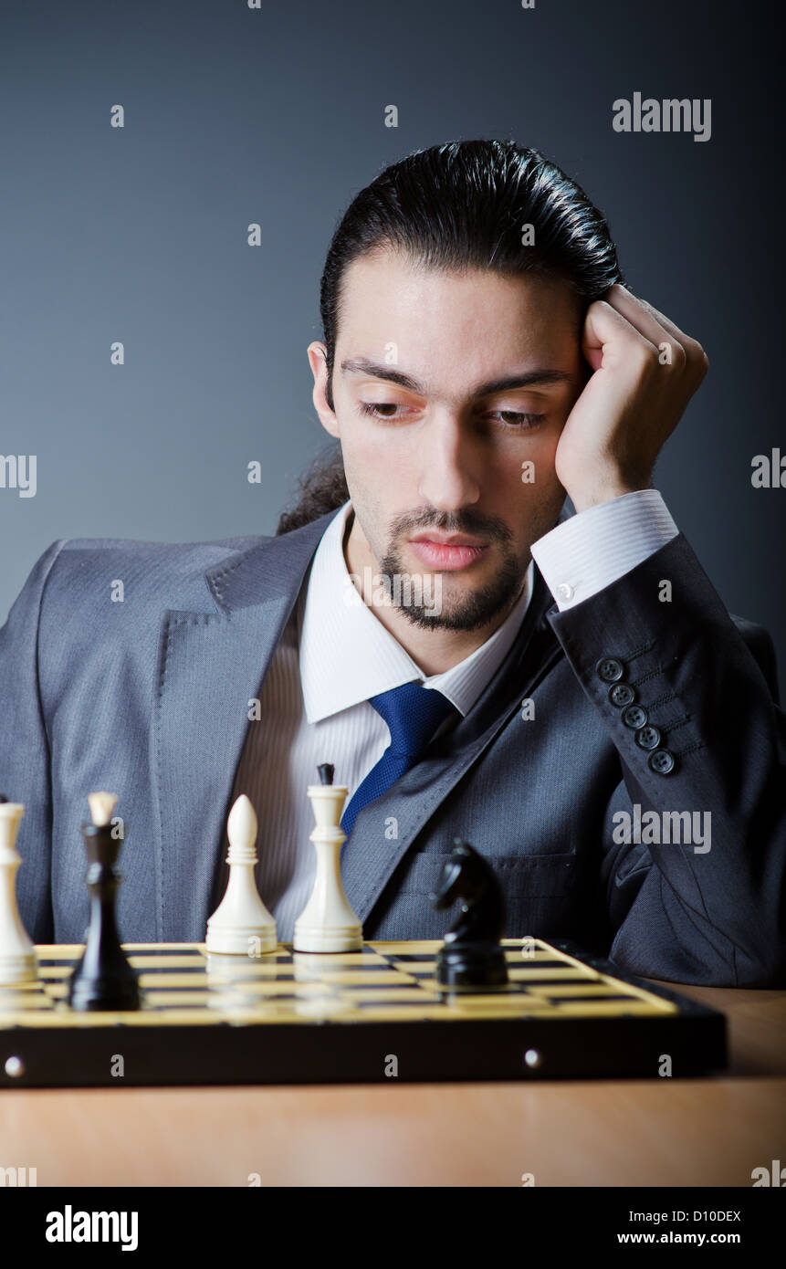 Chess player playing his game Stock Photo - Alamy