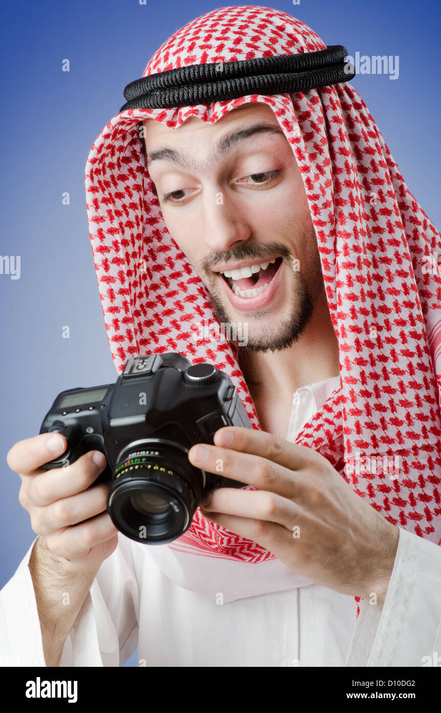 Arab photographer in studio shooting Stock Photo - Alamy