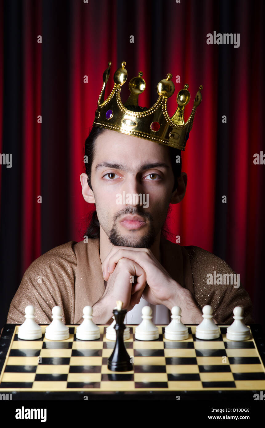 Chess player playing his game Stock Photo - Alamy