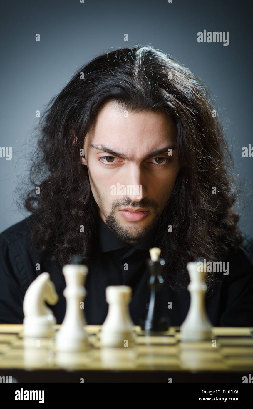 Chess player playing his game Stock Photo - Alamy