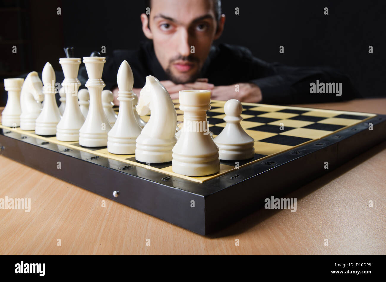 Chess player playing his game Stock Photo - Alamy