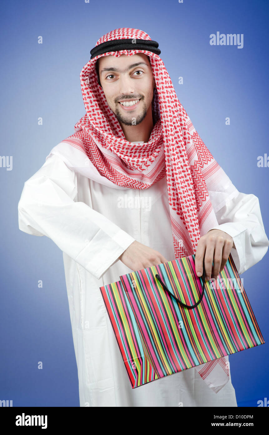 Arab with the gift bags Stock Photo - Alamy