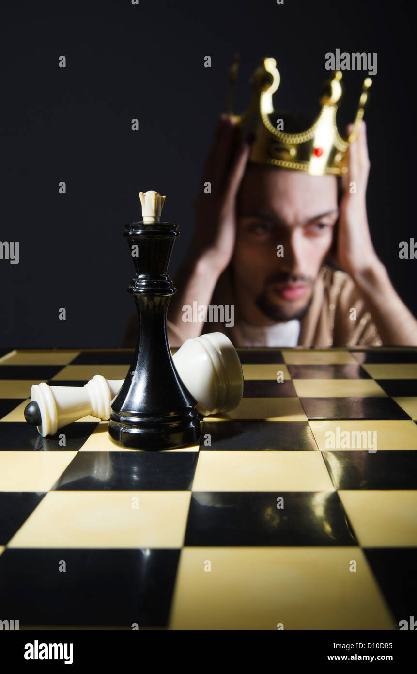 Chess player playing his game Stock Photo - Alamy