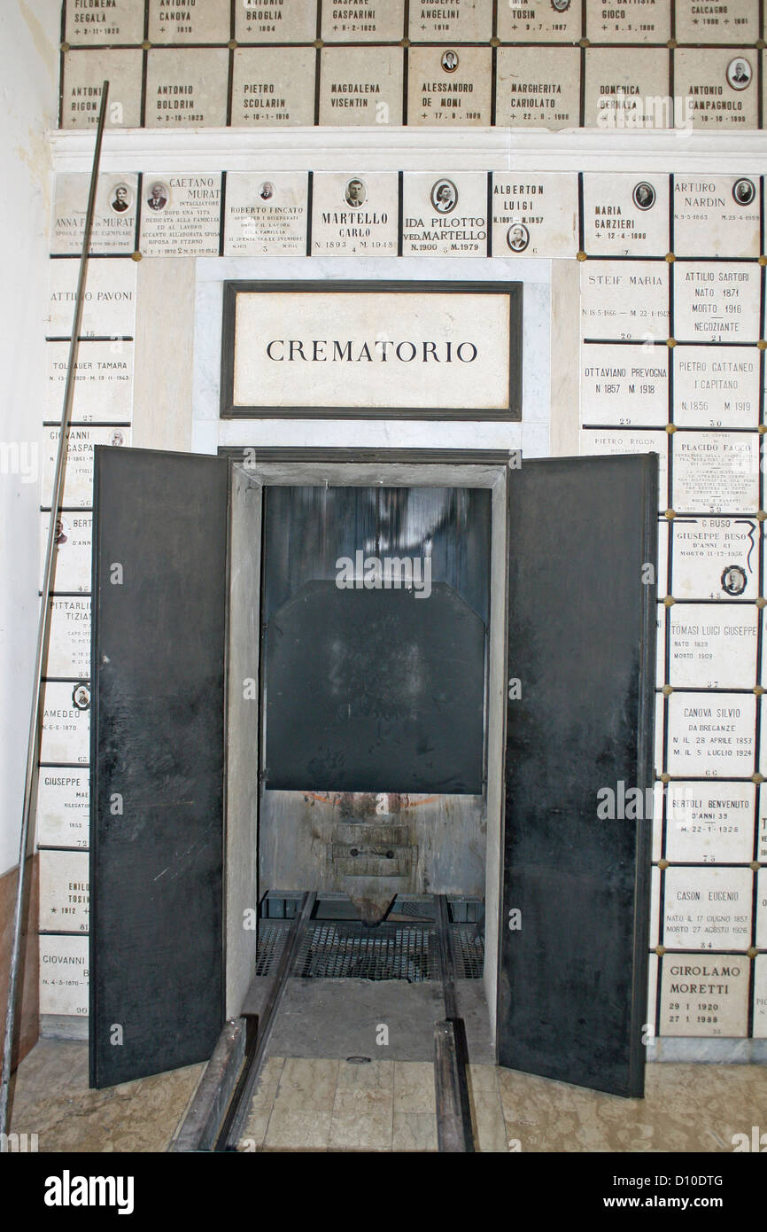 steel door of a crematorium in a cemetery for the cremation of the dead ...