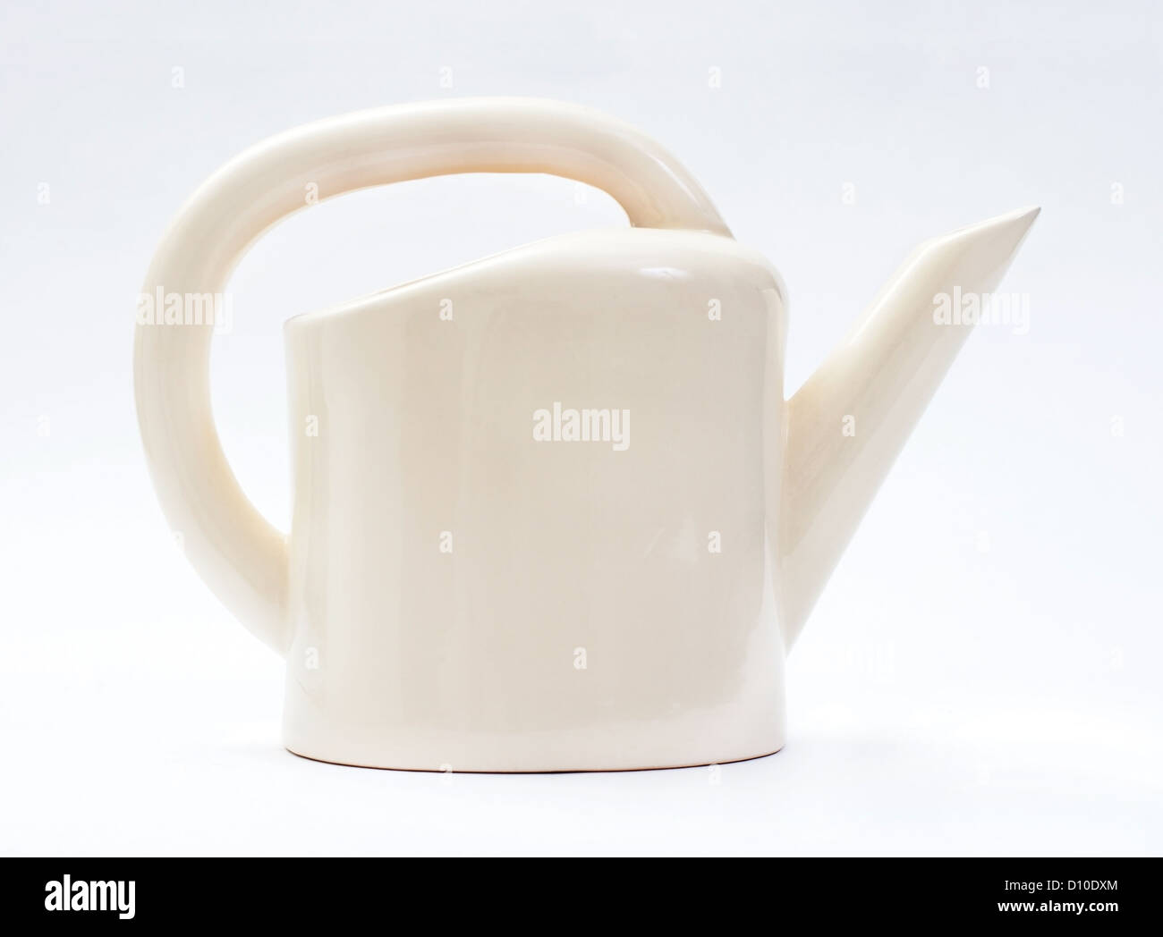 ceramic watering can gracefully shaped cream-colored with drop shadow ...