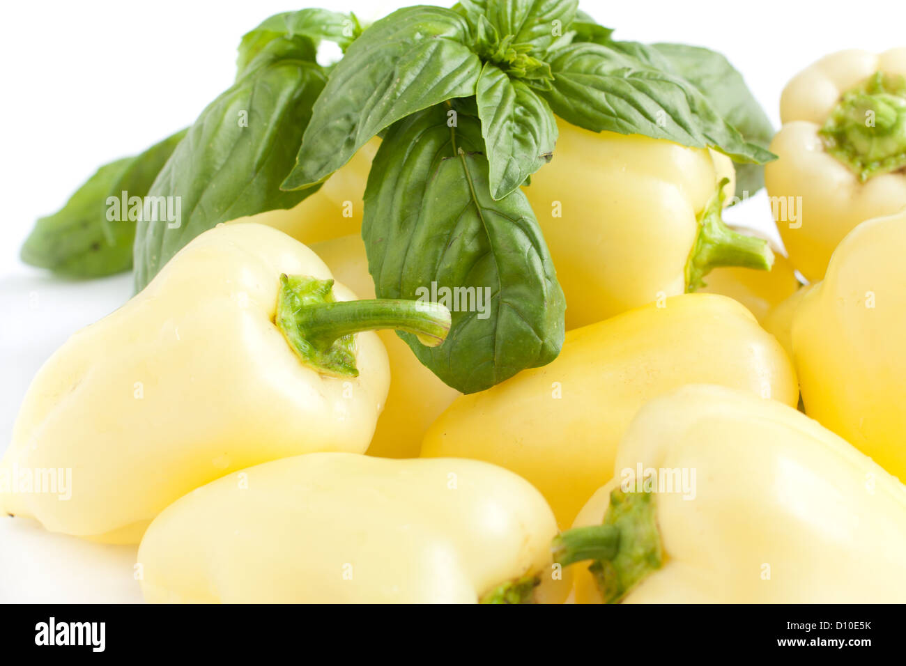 raw yellow pepper lies mound, close up Stock Photo - Alamy