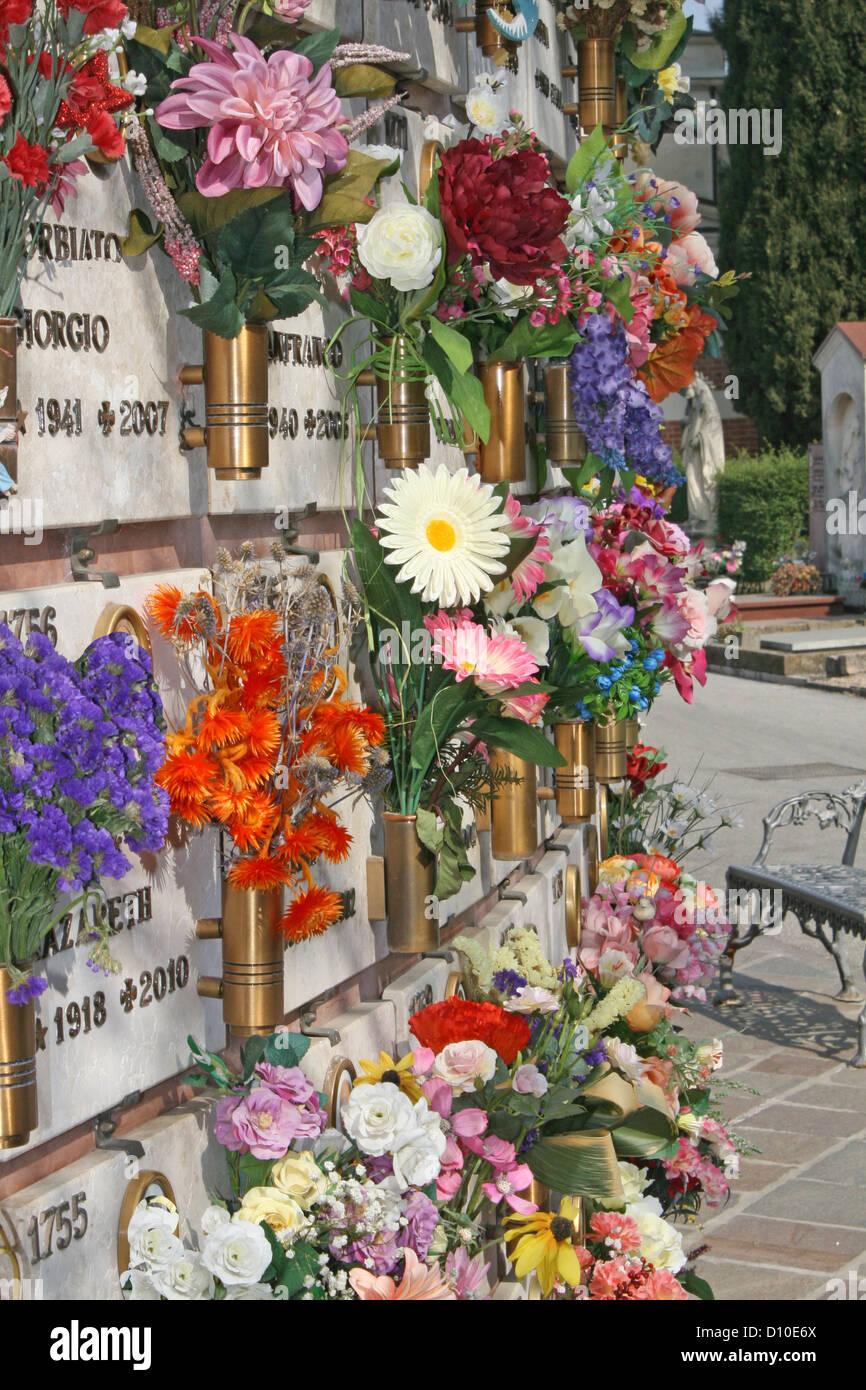 graves headstones and crucifixes of a cemetery outdoor in Italy Stock ...