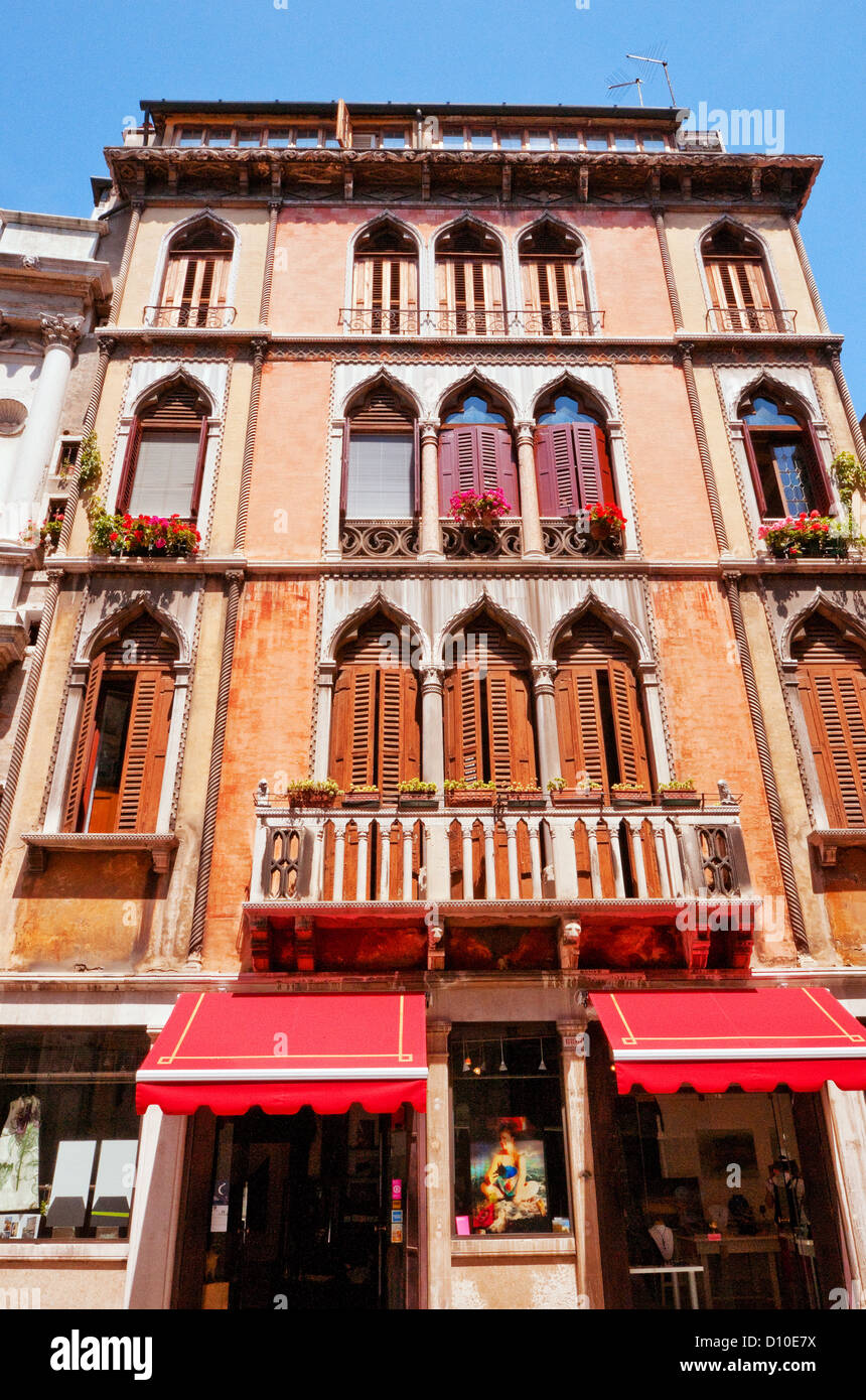 Building with red awning in Venice, Italy Stock Photo - Alamy