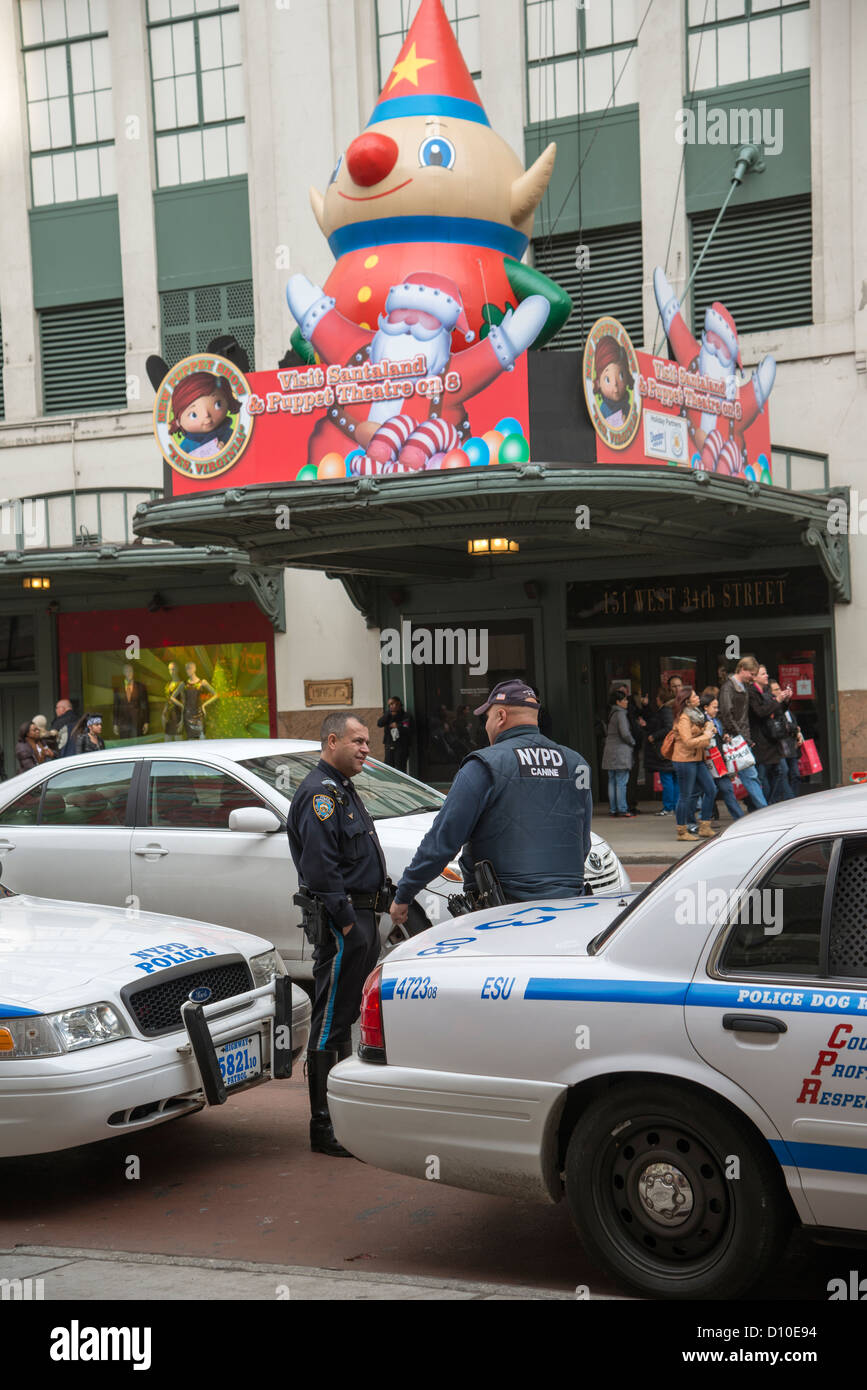 New York cops on patrol outside at Christmas time Macy's store in New ...