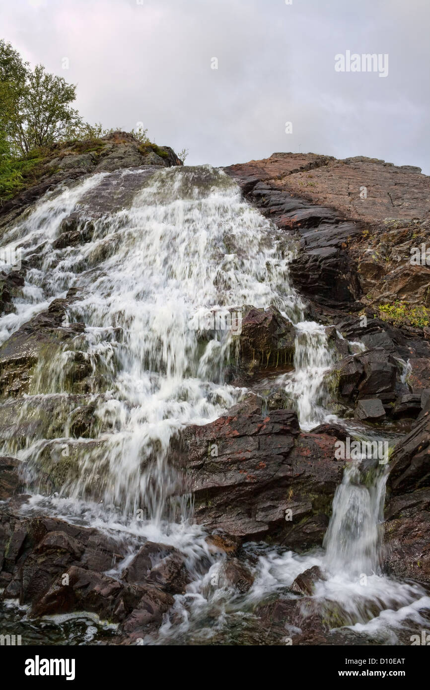 closeup of water flowing over falls, time exposure Stock Photo - Alamy