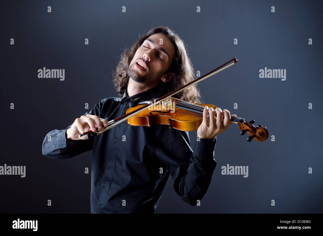 Young violin player playing Stock Photo - Alamy