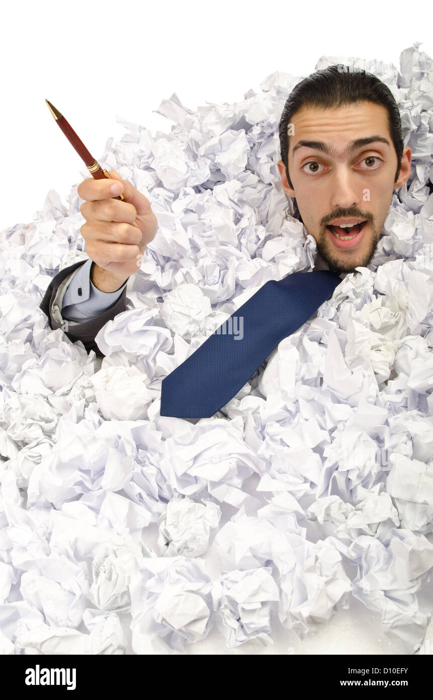 Man with lots of crumpled paper Stock Photo - Alamy