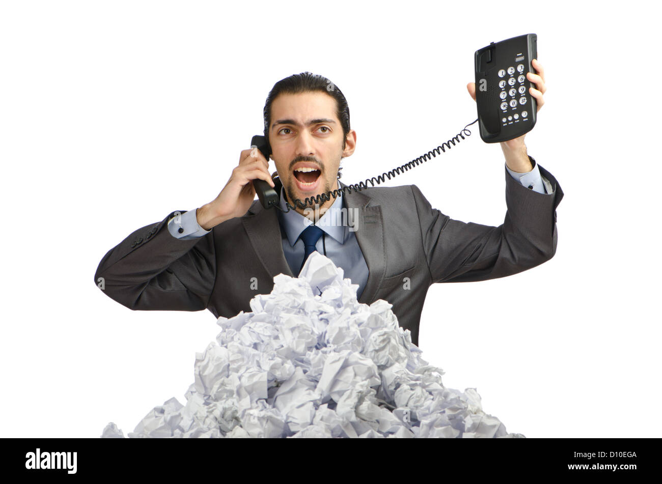 Man with lots of crumpled paper Stock Photo - Alamy