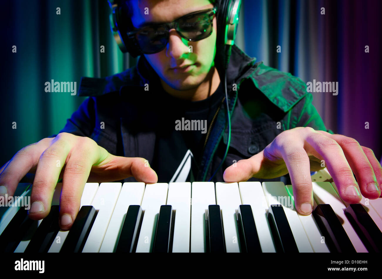 DJ mixing music at disco Stock Photo - Alamy