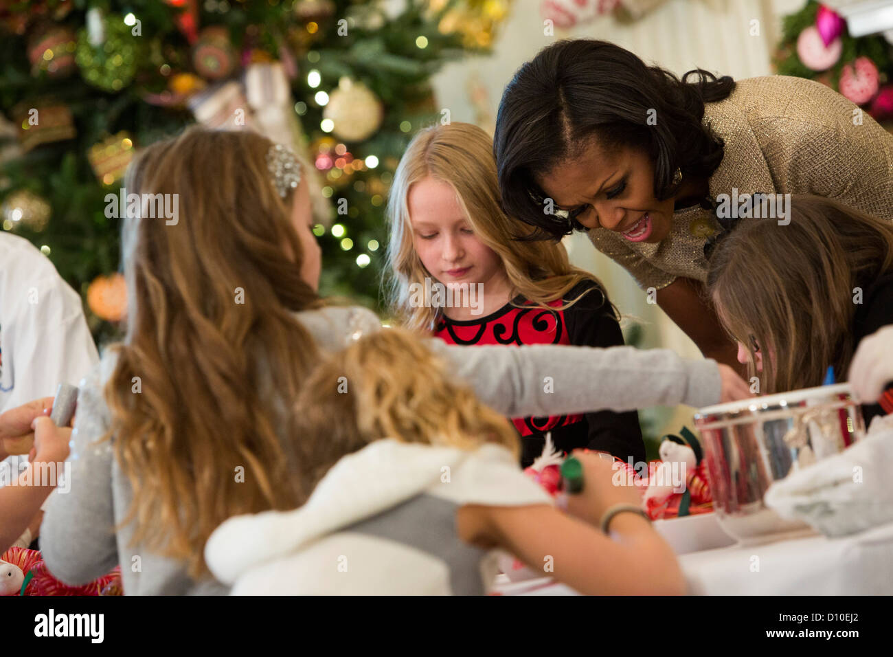 First Lady Michelle Obama makes holiday crafts with children during the ...
