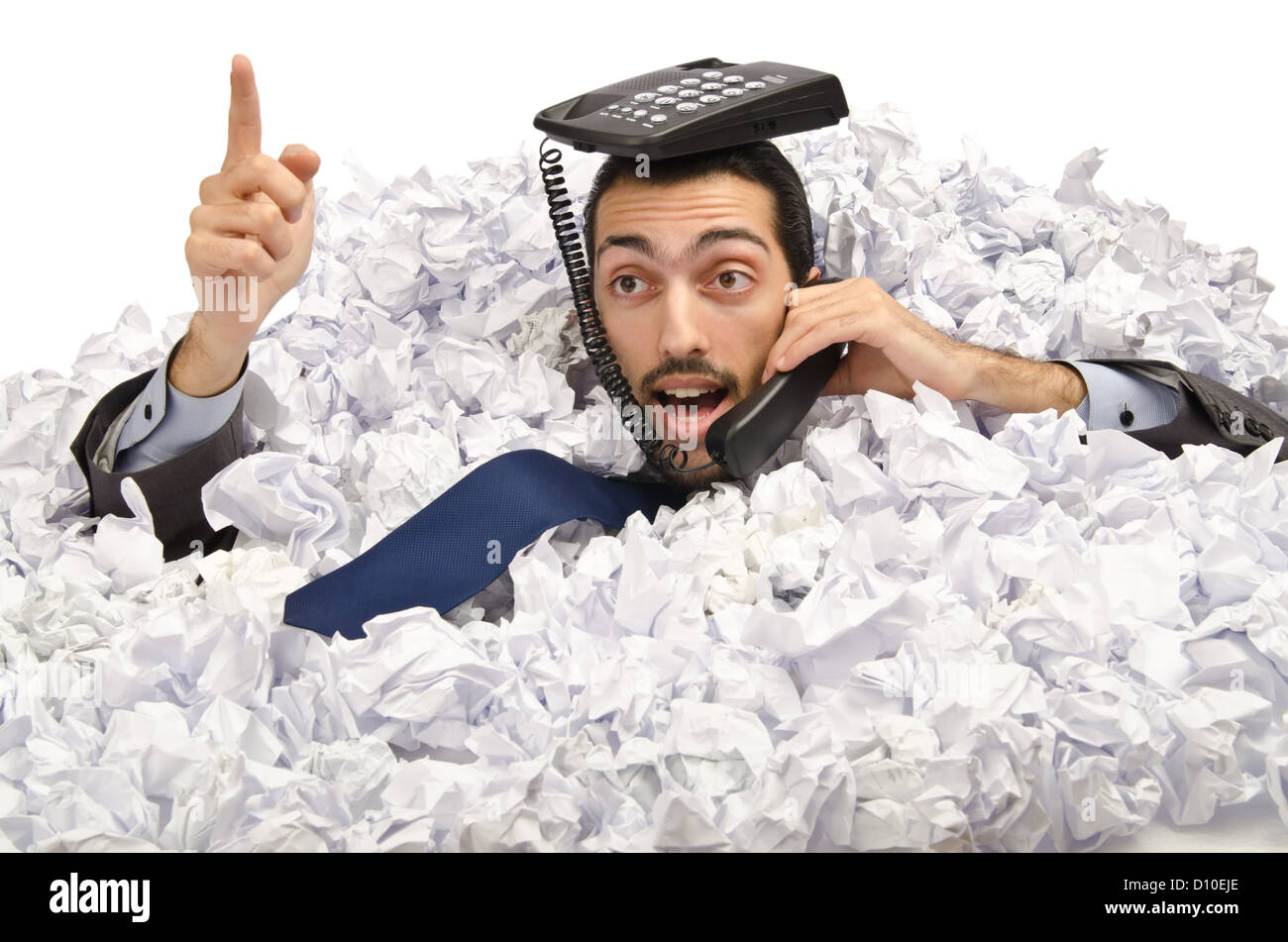 Man with lots of crumpled paper Stock Photo - Alamy