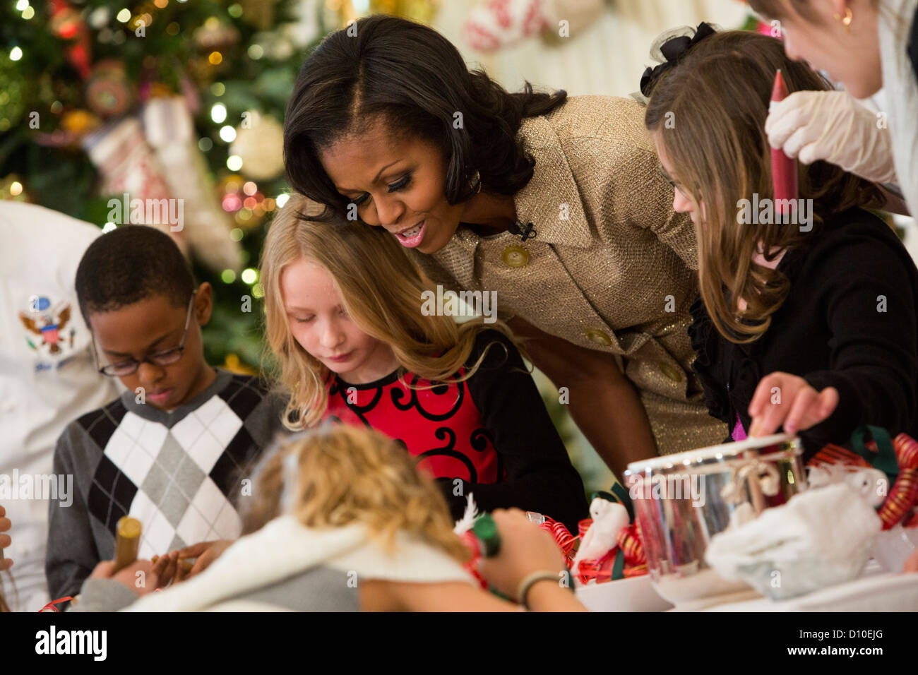 First Lady Michelle Obama makes holiday crafts with children during the ...