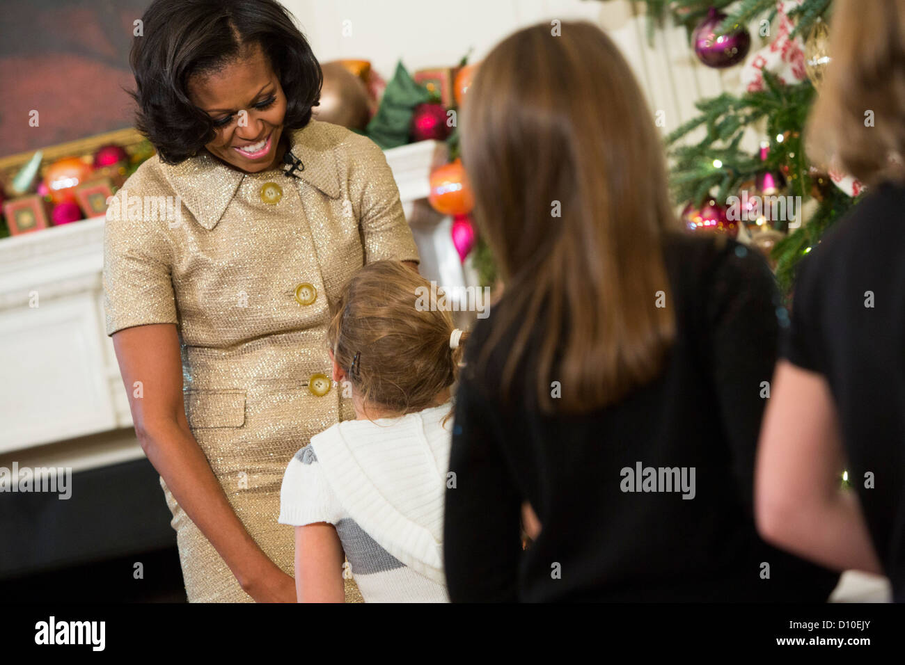 First Lady Michelle Obama makes holiday crafts with children during the ...