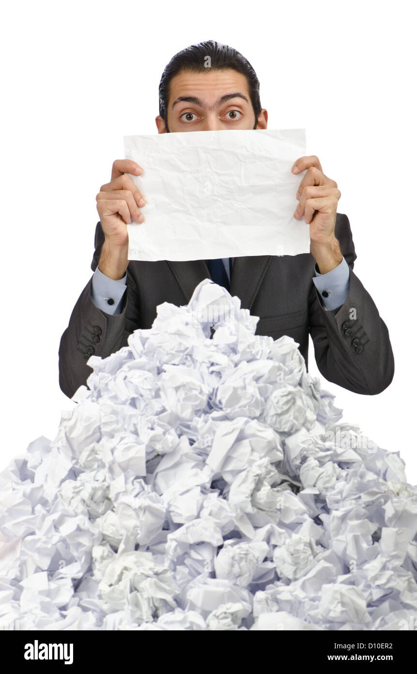 Man with lots of crumpled paper Stock Photo - Alamy
