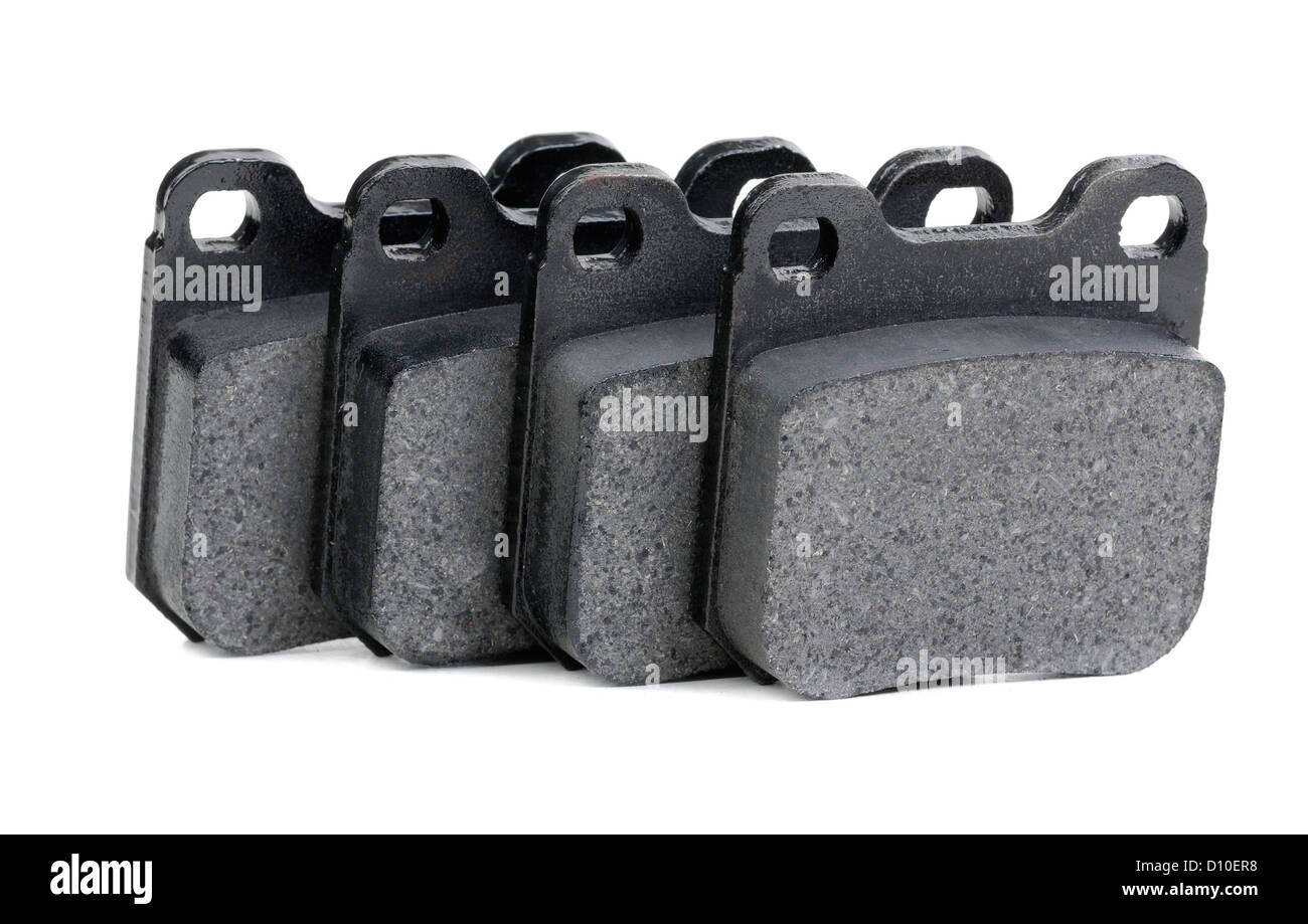 brake pads closeup isolate on white background Stock Photo - Alamy