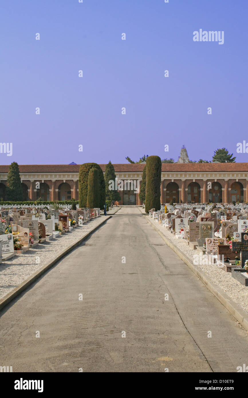 graves headstones and crucifixes of a cemetery outdoor in Italy Stock ...
